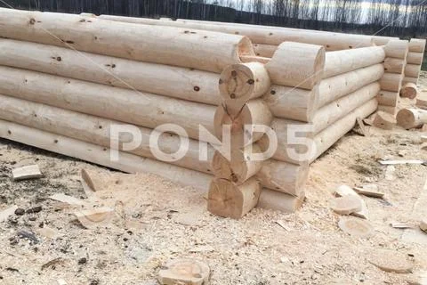 Drying and assembly of wooden log house at a construction base. ~ Hi ...