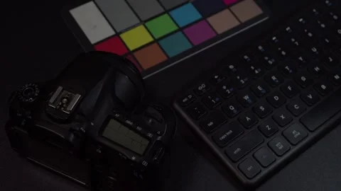 DSLR Camera, PC Keyboard, Color Chart | Stock Video | Pond5