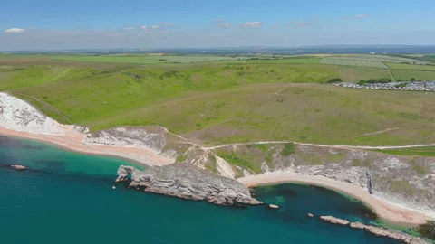 Durdle Door, UK: Aerial view of famous r... | Stock Video | Pond5