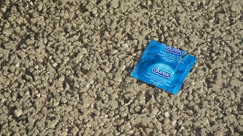 Condom Wrapper Stock Video Footage | Royalty Free Condom Wrapper Videos ...