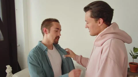 During entertaining conversation, standi... | Stock Video | Pond5