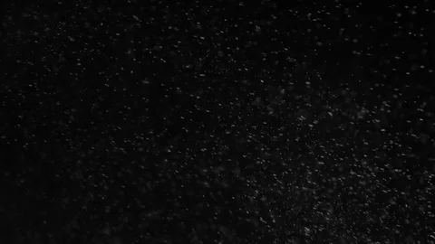 Dust falling on black background | Stock Video | Pond5