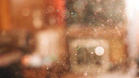 Dust particles fly in the air illuminate... | Stock Video | Pond5