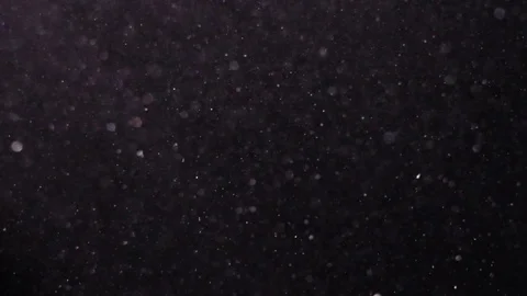 Dust particles suspended in the air blac... | Stock Video | Pond5