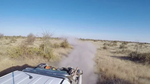 Dust trail kicked up behind truck in the... | Stock Video | Pond5