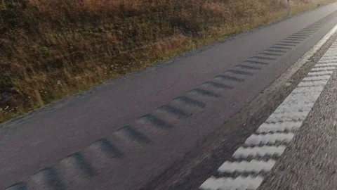 Dutch angle tilt rear view asphalt road ... | Stock Video | Pond5