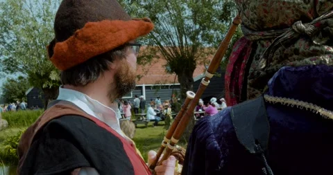 A Dutch man in a traditional costume wit... | Stock Video | Pond5