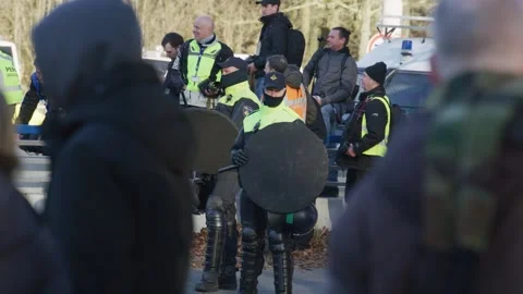 Dutch riot police with shield at Extinct... | Stock Video | Pond5