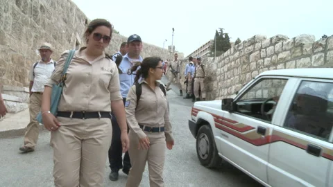 Off Duty Jewish Security Officers Walk W... | Stock Video | Pond5