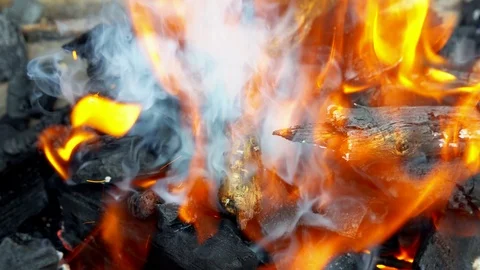 . The dying embers in the fireplace, Bur... | Stock Video | Pond5