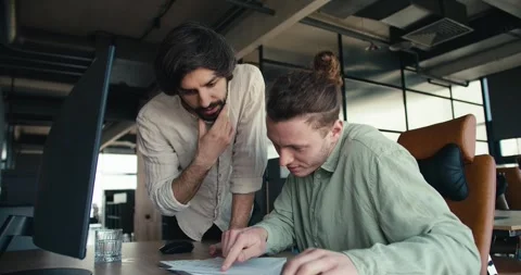 Dynamic Duo: Cooperative Work and Shared... | Stock Video | Pond5