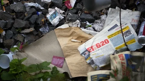 Newspaper Trash Stock Footage ~ Royalty Free Stock Videos | Pond5