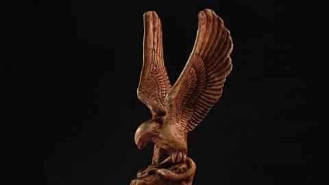 Eagle and snake. Plaster figurine. | Stock Video | Pond5