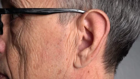 The ear of an elderly man in close-up. E... | Stock Video | Pond5