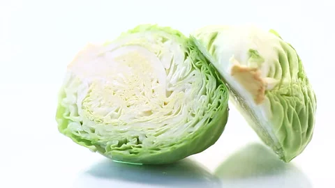 early green cabbage cut in half swing on... | Stock Video | Pond5