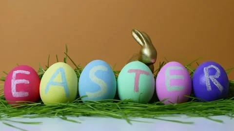 Easter animation colorful eggs and golde... | Stock Video | Pond5