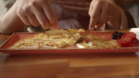 eating Plain Egg Omelette on table | Stock Video | Pond5