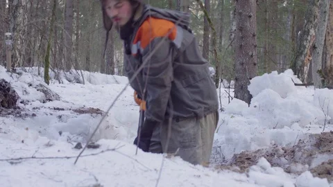 Ecologist in the forest digging a soil s... | Stock Video | Pond5