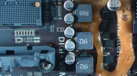 ECU of cola flooding computer's innards.... | Stock Video | Pond5