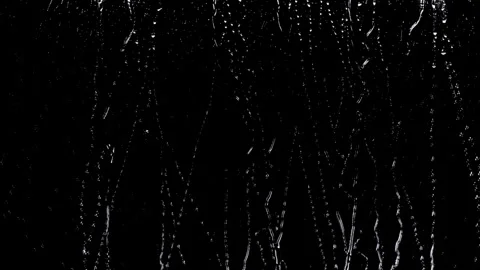 The effect of rain on glass on a black b... | Stock Video | Pond5