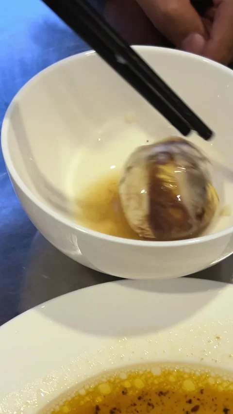 Egg with embryo Vietnamese delicacy. Bal... | Stock Video | Pond5