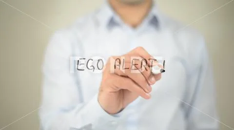 Ego Alert , man writing on transparent screen Stock Image #79204936