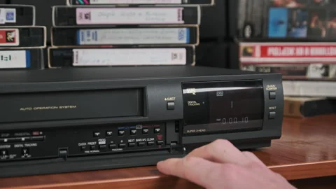 Eject VHS Tape Cassette From VCR Player | Stock Video | Pond5