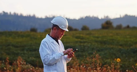 Elder engineer wearing hard hat and whit... | Stock Video | Pond5