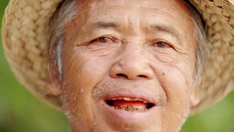 elderly asian man in straw hat, winkles ... | Stock Video | Pond5