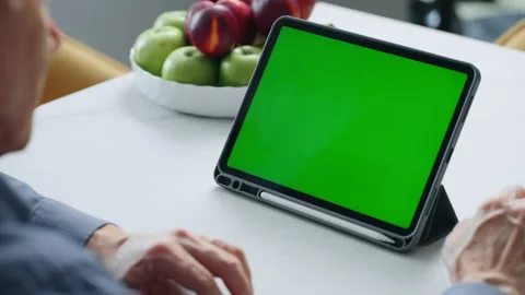 Elderly Man Speaking By Video Call On Ta... | Stock Video | Pond5