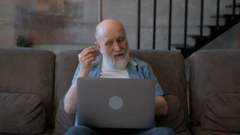 Elderly old man talks to his family via ... | Stock Video | Pond5