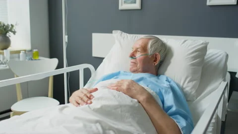 Elderly Patient with Nasal Cannula Lying... | Stock Video | Pond5