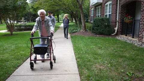 Elderly senior old woman using walker fo... | Stock Video | Pond5