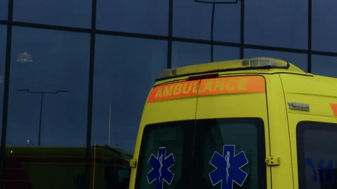 An electric blue ambulance vehicle parke... | Stock Video | Pond5