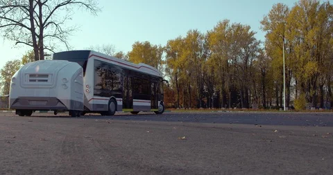 An electric bus with a trailer | Stock Video | Pond5