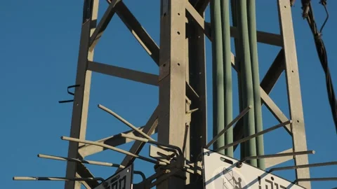 Electric pole Israel camera tilt up war... | Stock Video | Pond5
