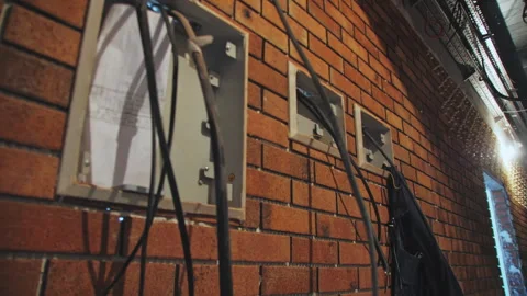 Electric wires connected to brick wall i... | Stock Video | Pond5