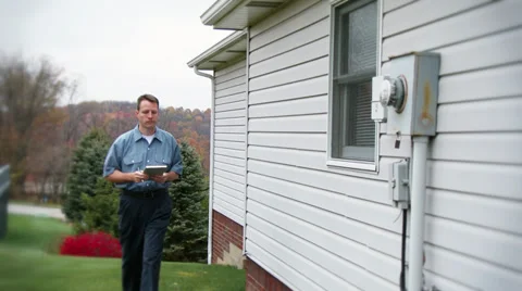 Electrical Meter Reader Approaches House... | Stock Video | Pond5