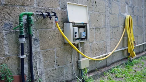 Electrical outlet box with water irrigat... | Stock Video | Pond5