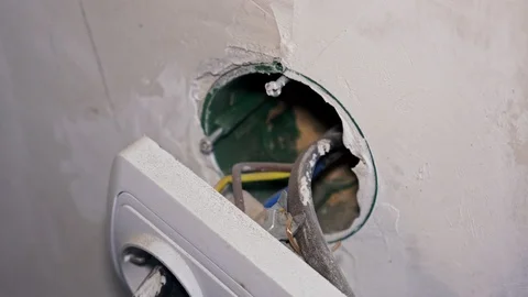 Electrical outlet in plaster sticking ou... | Stock Video | Pond5