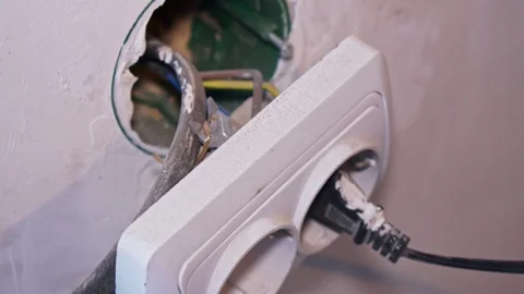 Electrical outlet in plaster sticking ou... | Stock Video | Pond5