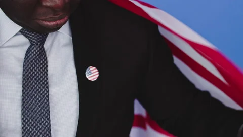 Elegant black man with American pin, wra... | Stock Video | Pond5