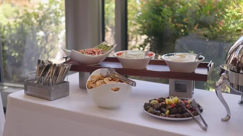 Elegant Buffet Setup with Varied Food It... | Stock Video | Pond5