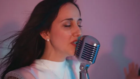 Elegant Side View of Singer with Vintage... | Stock Video | Pond5