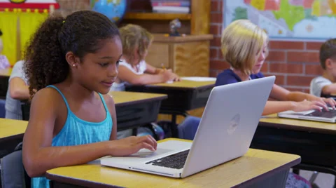 Elementary school students work on lapto... | Stock Video | Pond5