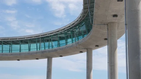 Elevated pedestrian walkway with reflect... | Stock Video | Pond5