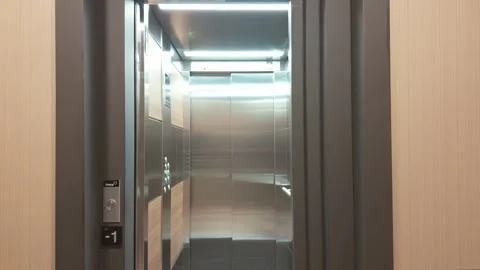 The elevator doors open. Opening door of... | Stock Video | Pond5