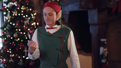 Elf man with magnifying glass inside the... | Stock Video | Pond5