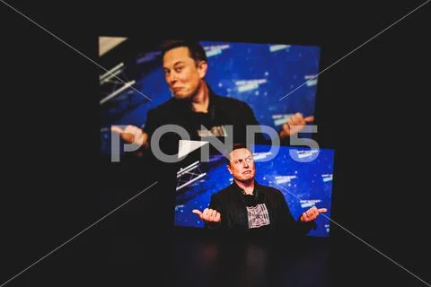 Elon Musk on screen. Elon Reeve Musk FRS is a business magnate and ...