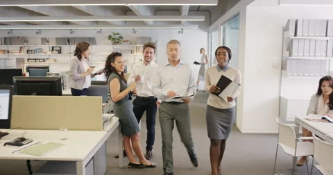 Embarrassed businessman walking into off... | Stock Video | Pond5